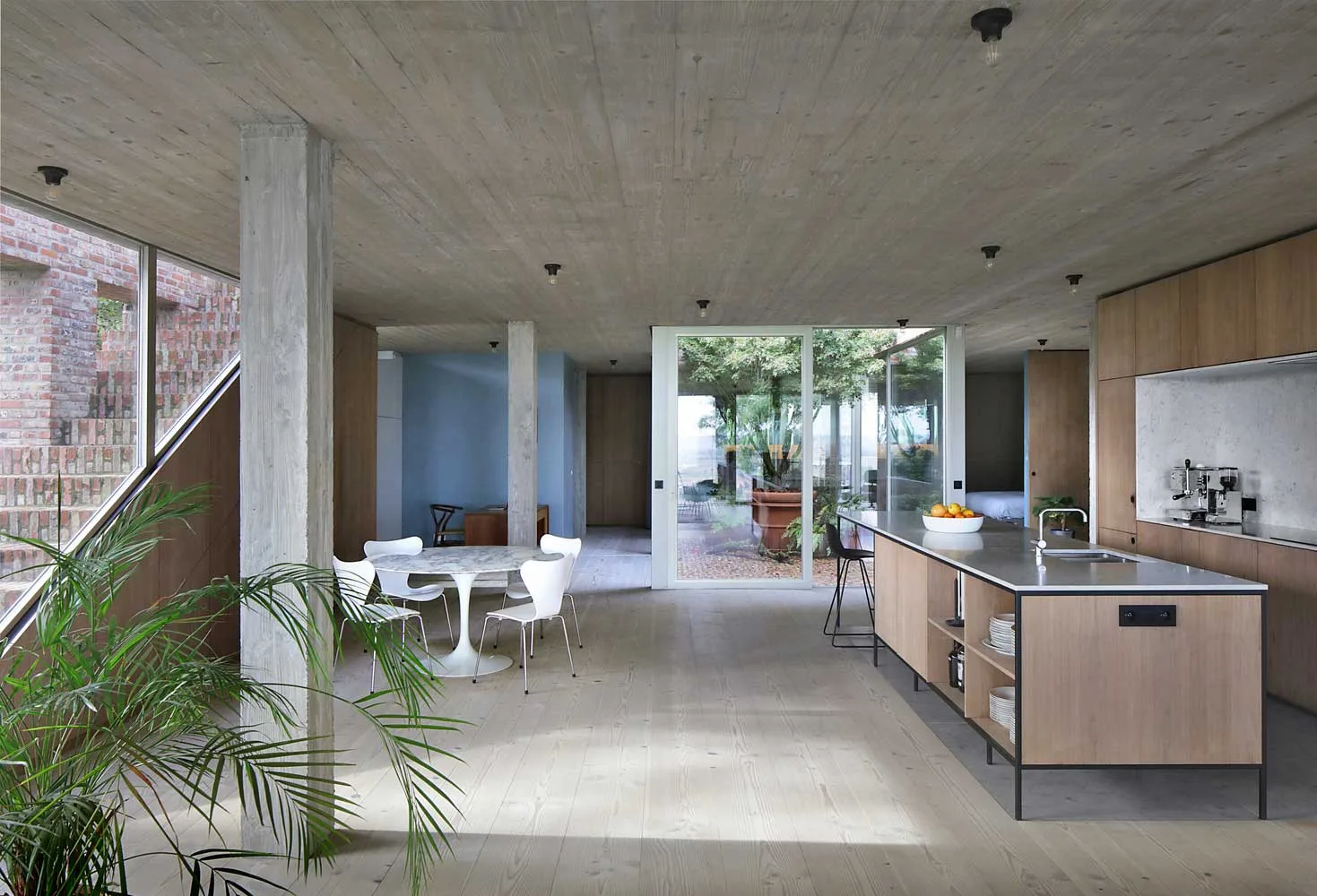 Steep Slope House With Bookshelflined Interior Modern House Designs