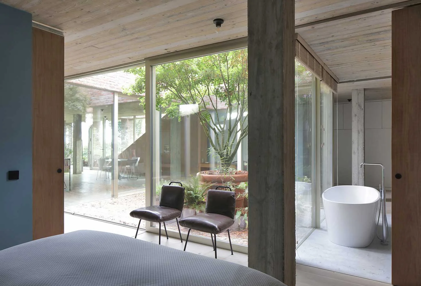 Steep Slope House With Bookshelflined Interior Modern House Designs