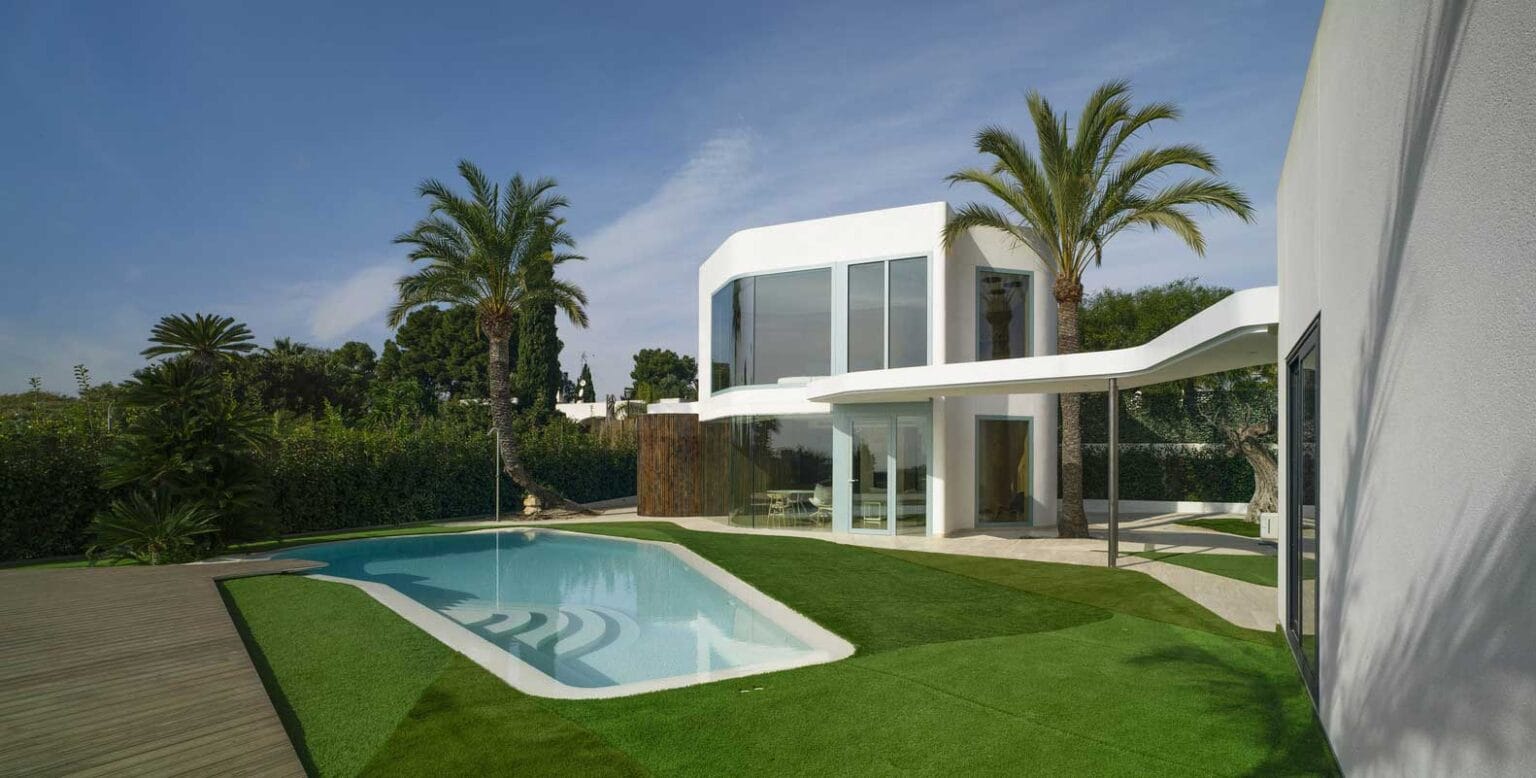 Flat Roof Double Storey Houses in Minimalist Style for a Modern Family