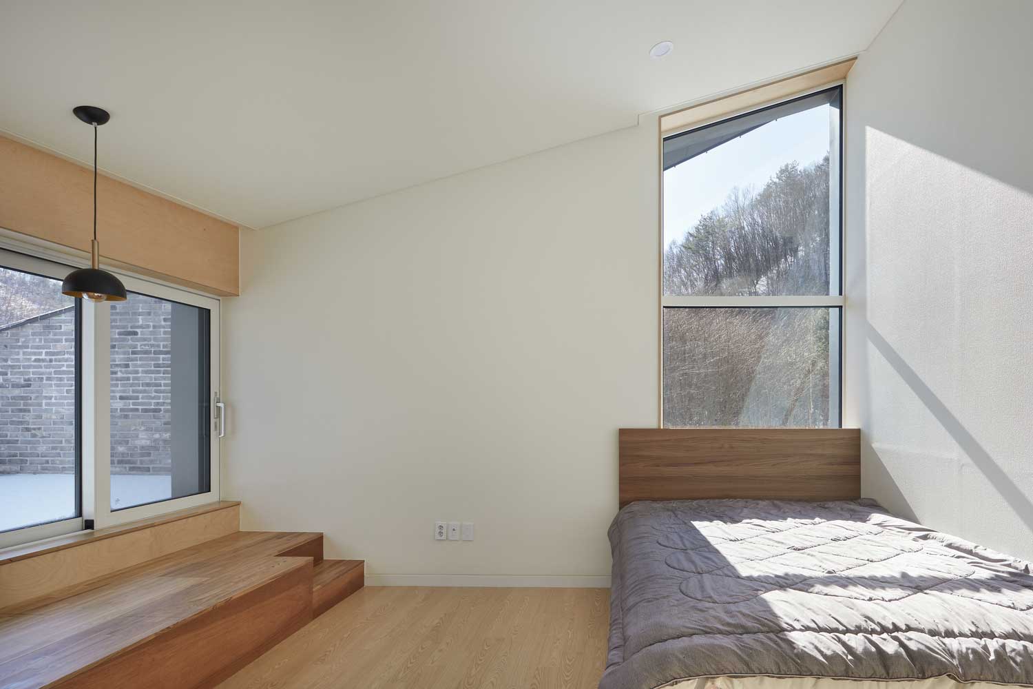 Stylish Pent Roof Frame House On A Hillside