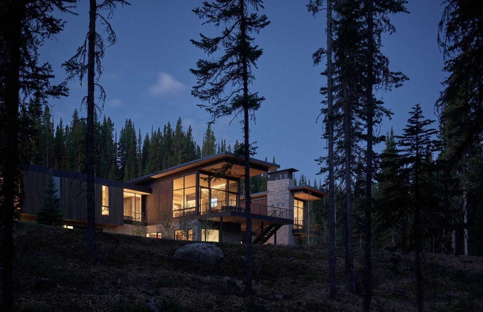 Sleek Glass Panels Enhancing the Exterior Beauty of Big Sky Homes ...