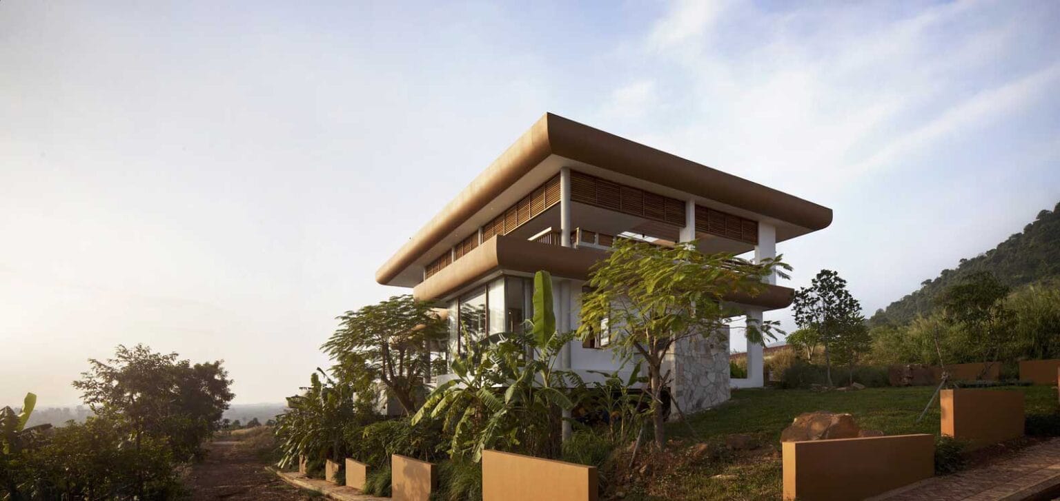 Elevated Pool and Outdoor Kitchen in a Two-Story Platform House