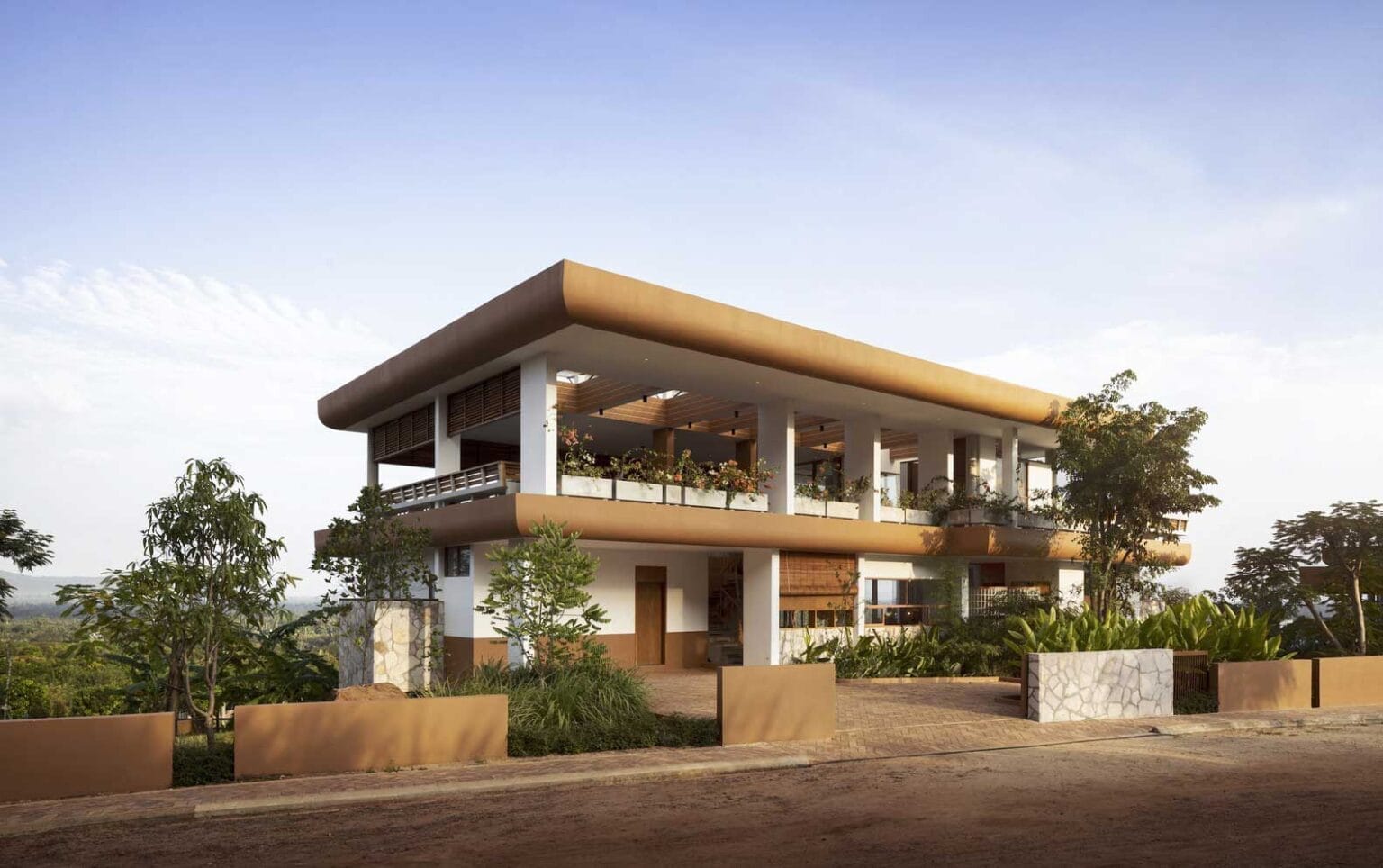 Elevated Pool and Outdoor Kitchen in a Two-Story Platform House