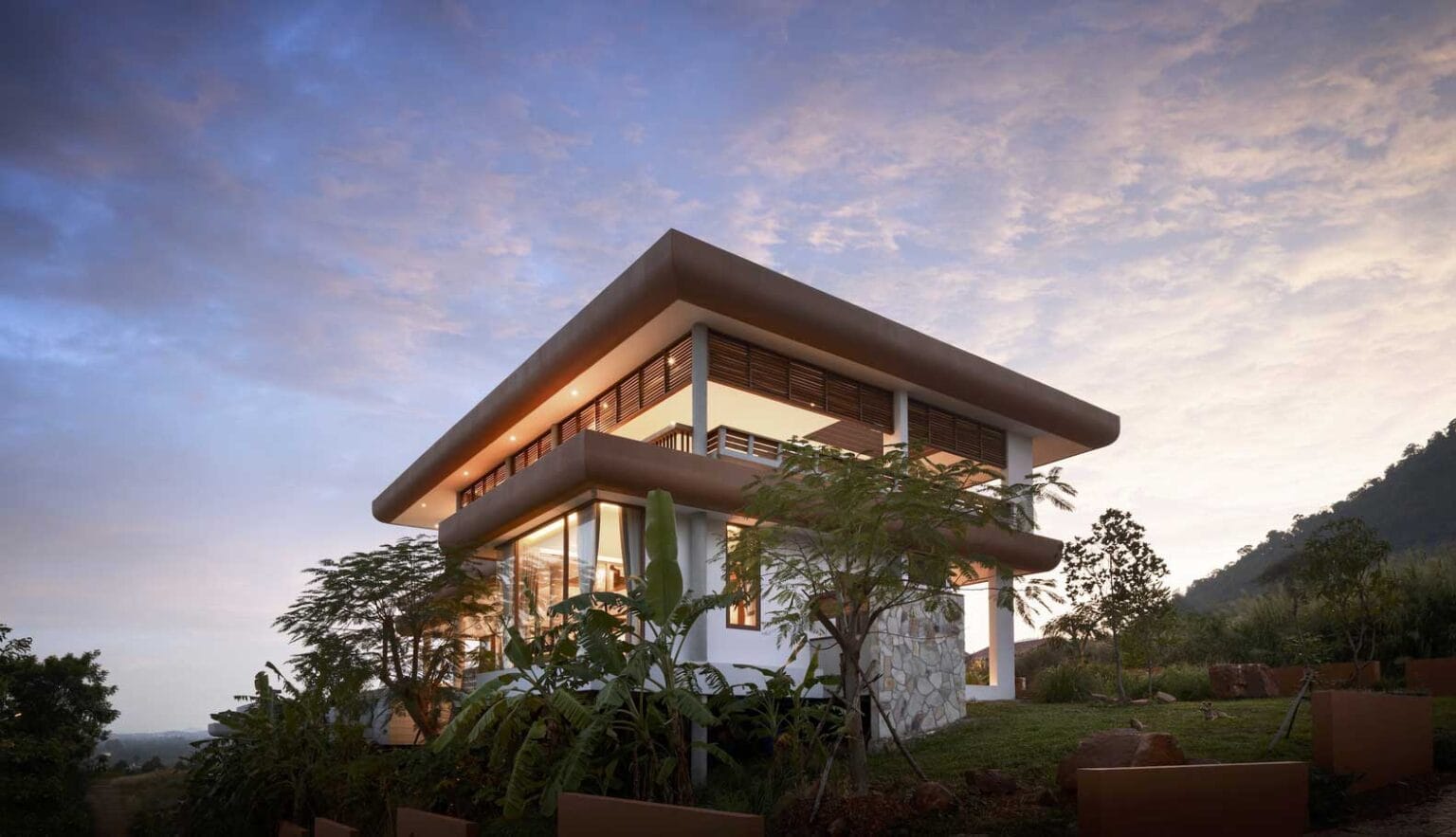 Elevated Pool and Outdoor Kitchen in a Two-Story Platform House