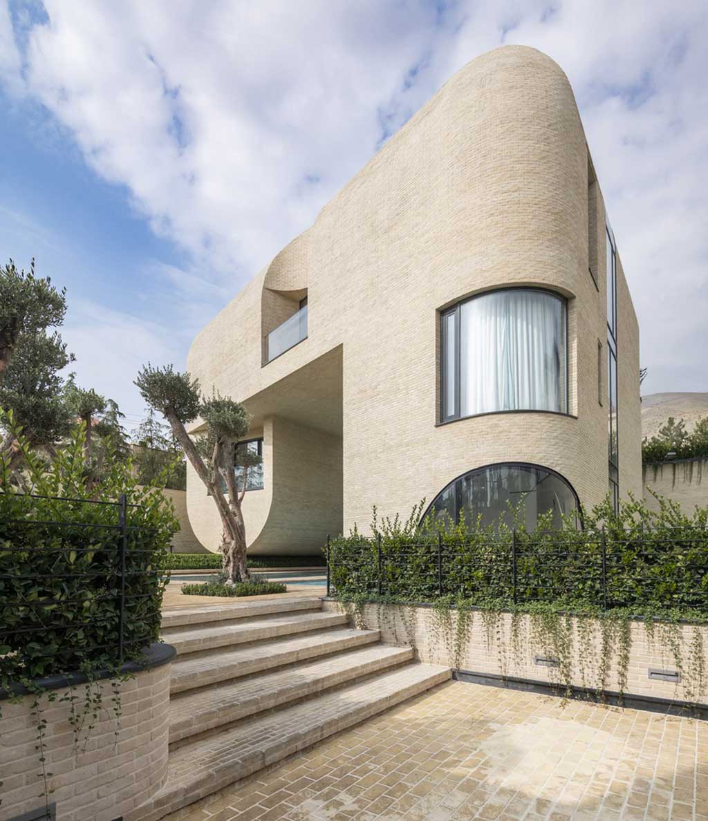 Warm Concrete and Glass Shapes Defining a Modern Villa’s Private ...